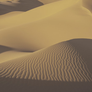 Sunlit sand dunes in the desert Royalty-Free Stock Image - Storyblocks