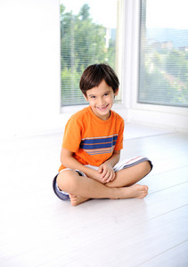 Happy children sitting at home, indoor Royalty-Free Stock Image ...