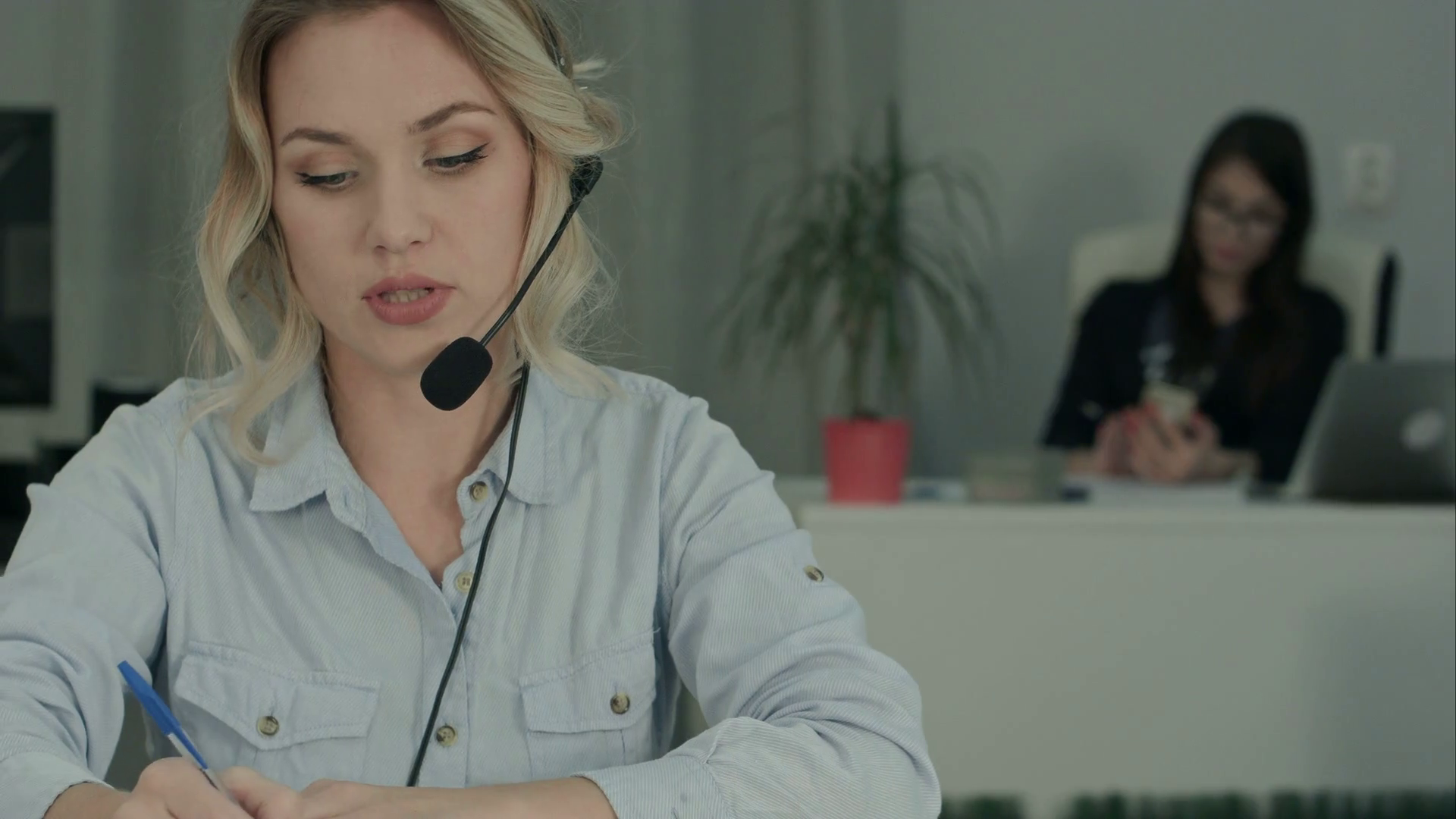 Busy Call Center Agent Using Digital Tablet Stock Footage SBV-311790510 ...