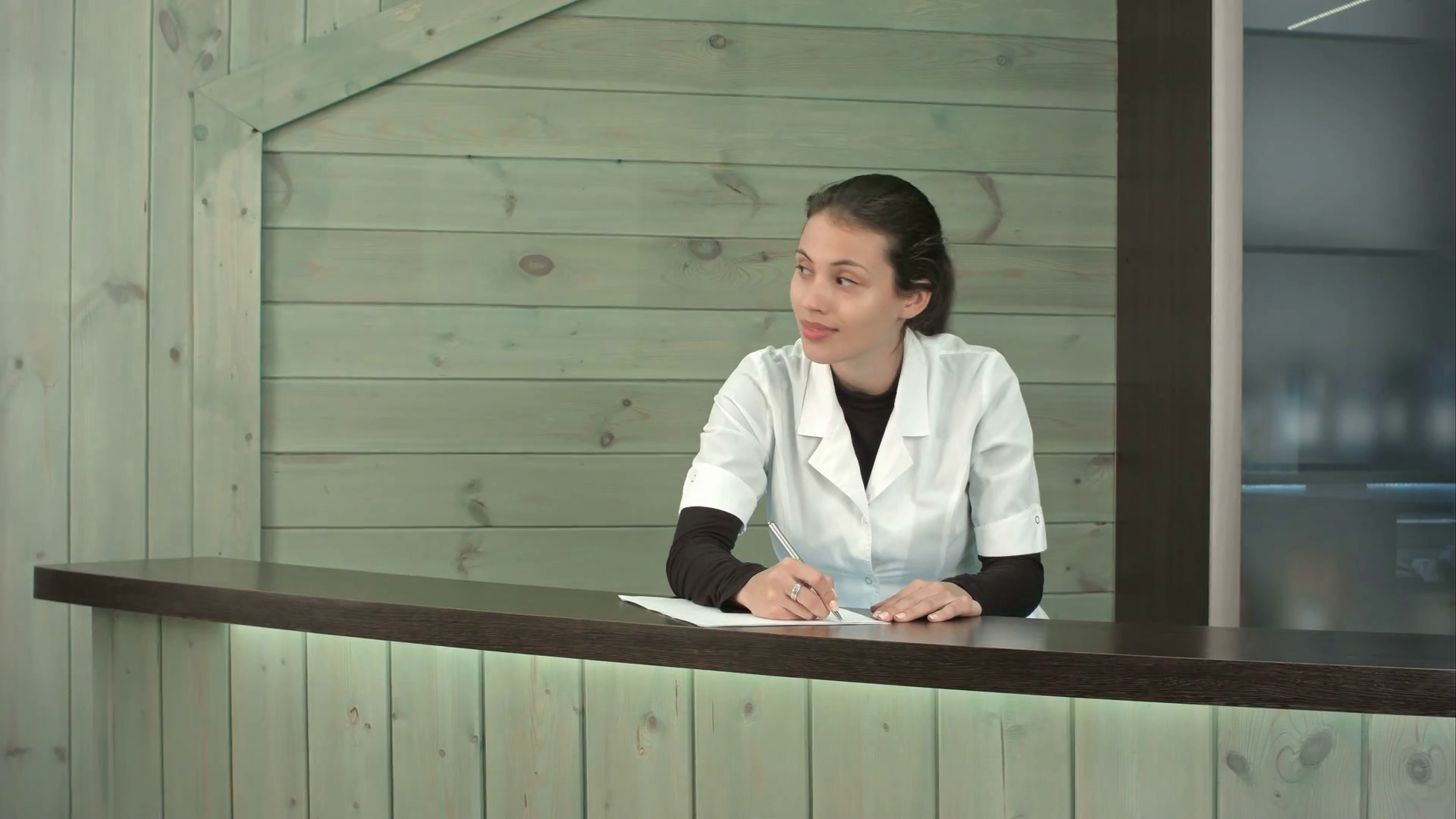 Smiling Spa Receptionist Greeting Female Stock Footage SBV-311795367 ...