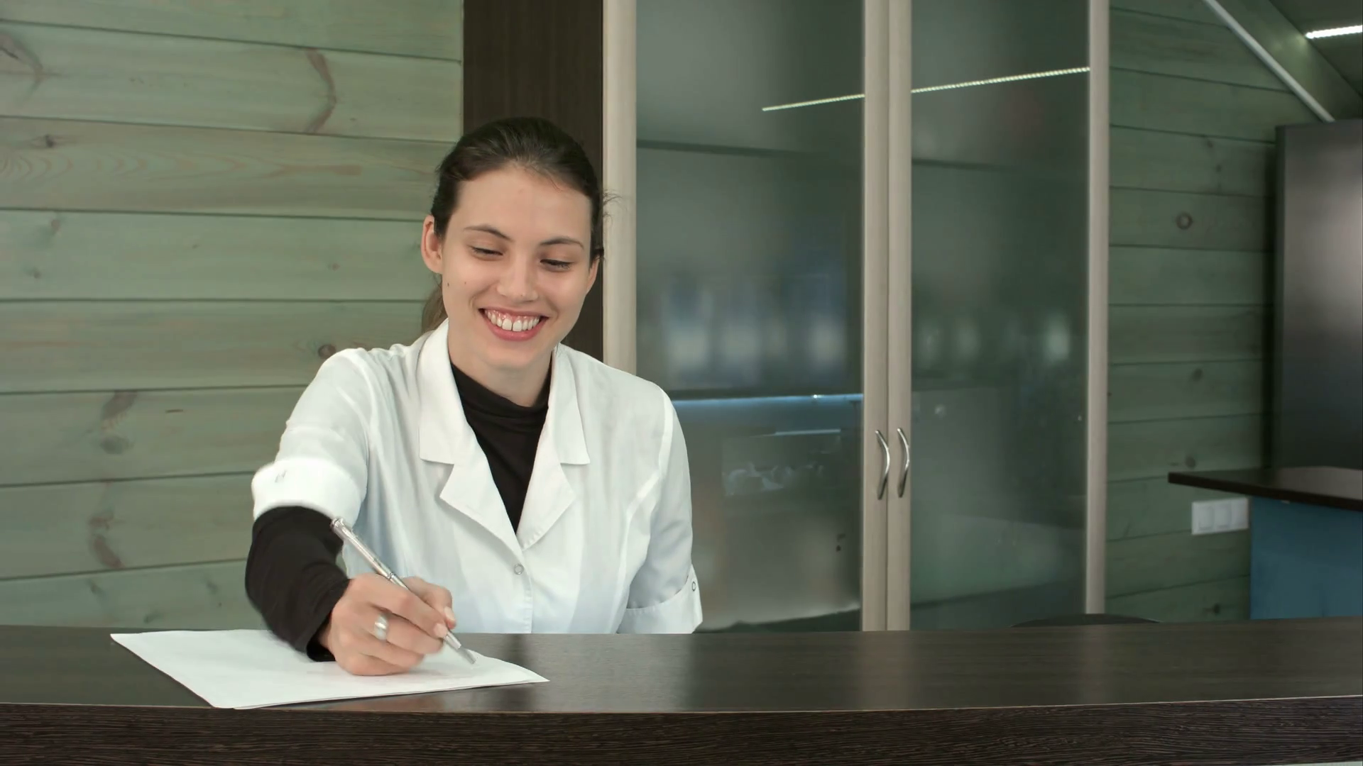 Smiling Spa Receptionist Talking To Client Stock Footage SBV-311794770 ...