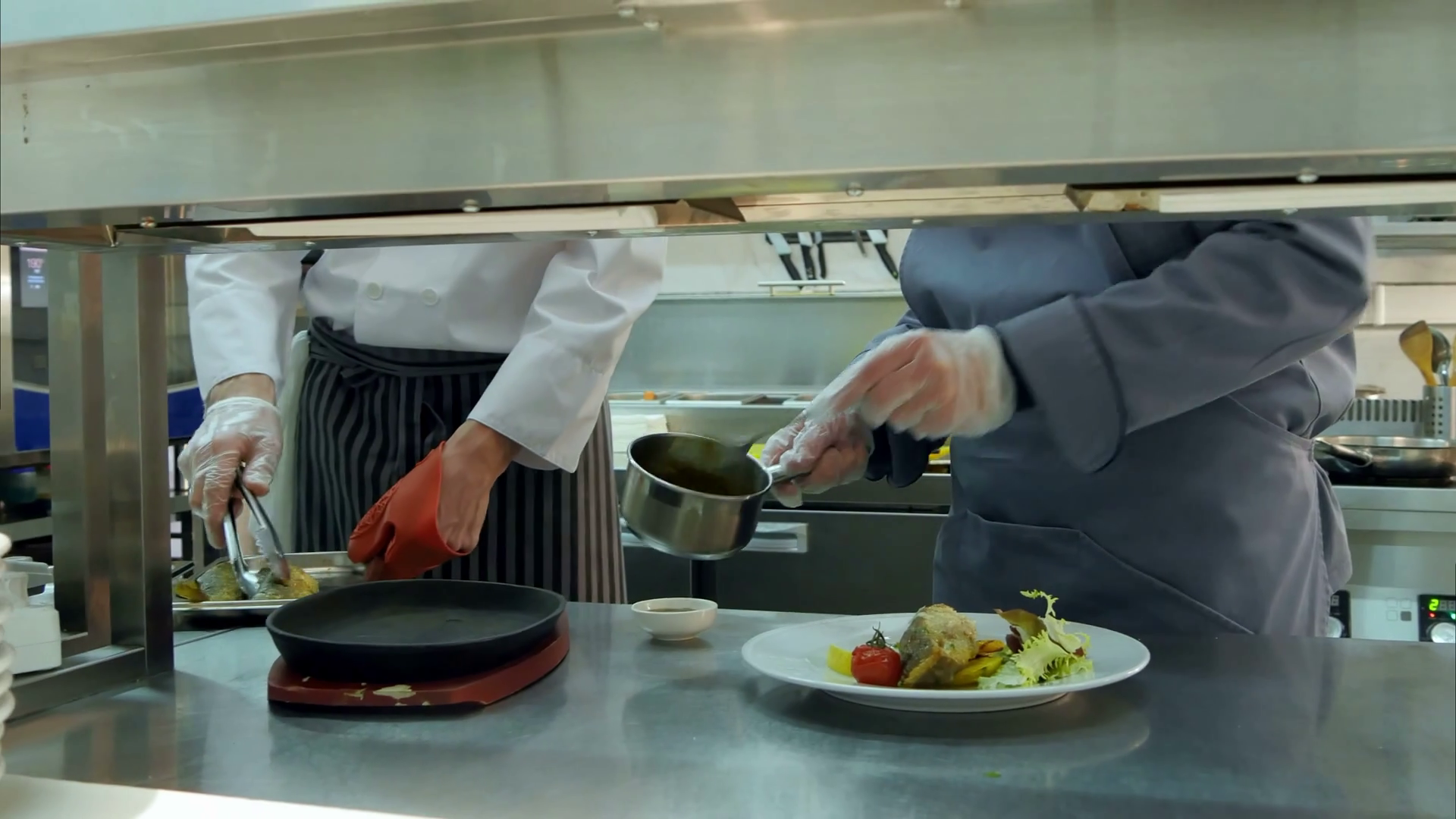 Two Busy Cooks At Work Cooking In Restaurant Stock Footage SBV ...