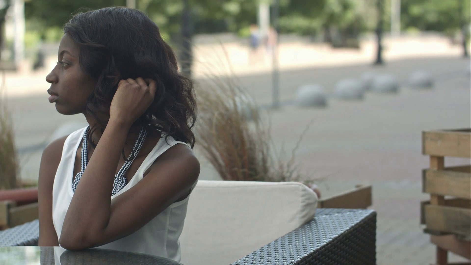 Black waiter serving terrace restaurant guest at table Stock Video ...