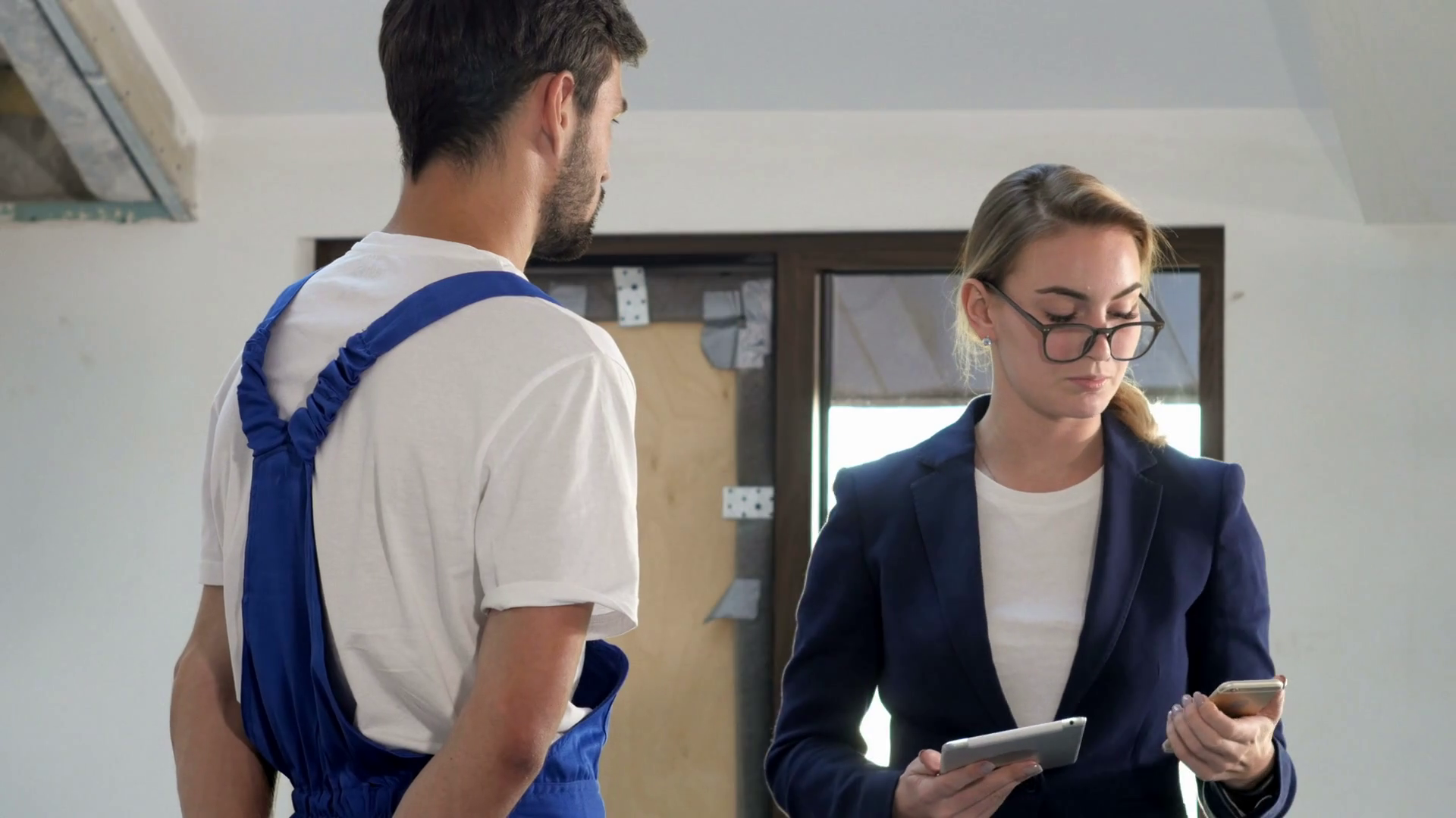 Female Contractor At Work Site Using Tablet Stock Footage SBV-324027911 ...