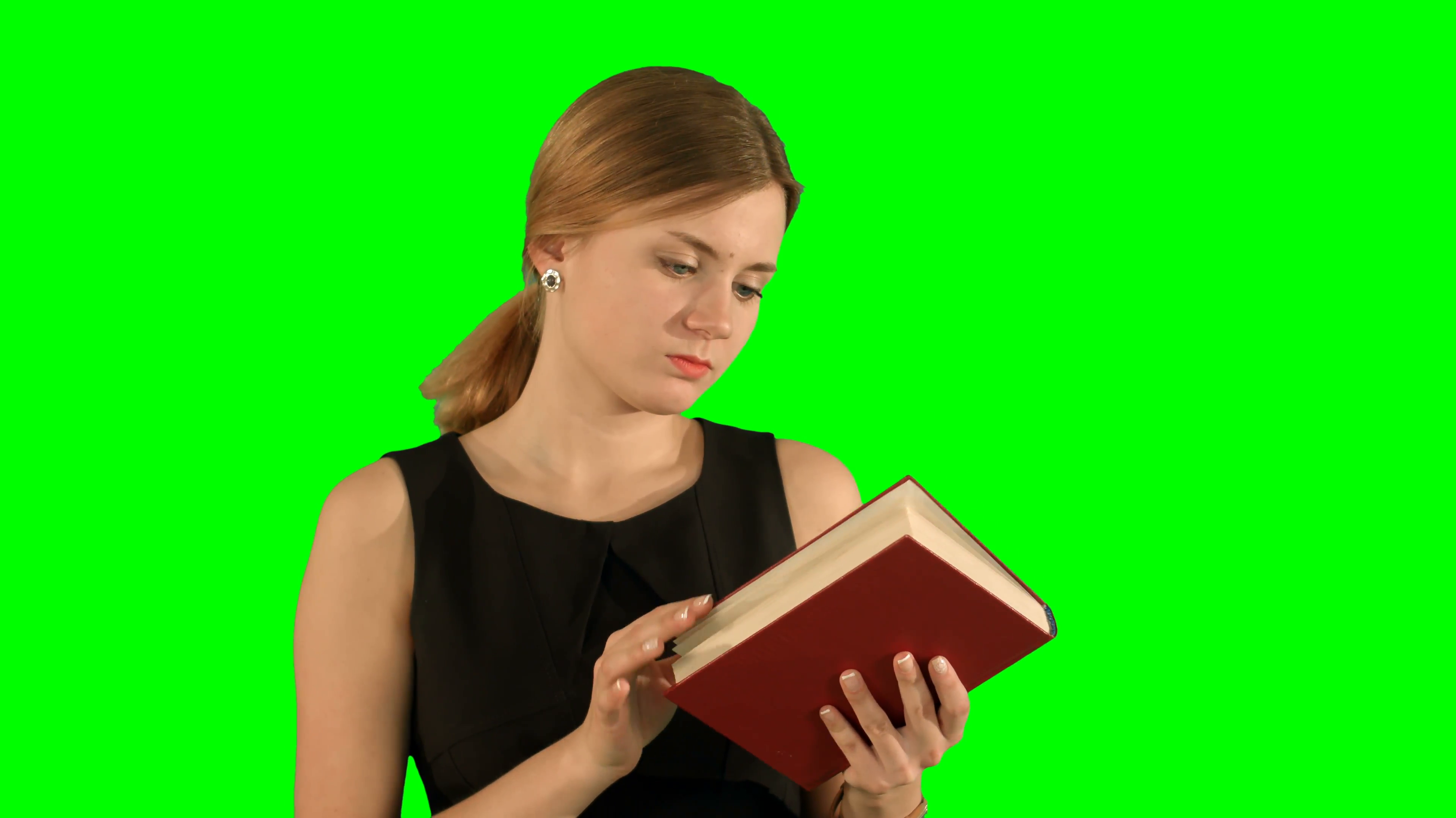 Young Person Reading Book On Laptop On Green Stock Footage SBV ...