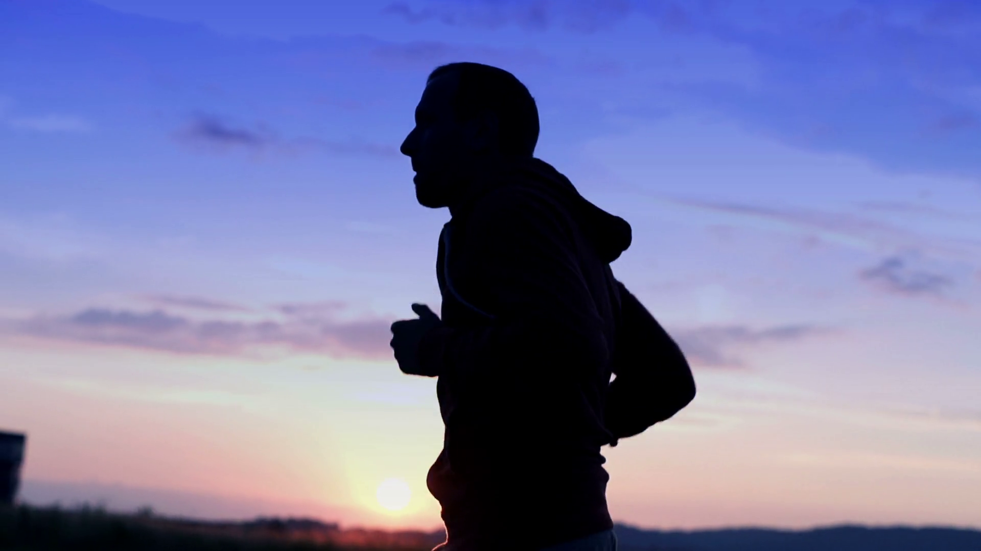 Young Man Jogging At Sunset Stock Footage SBV-302646319 - Storyblocks
