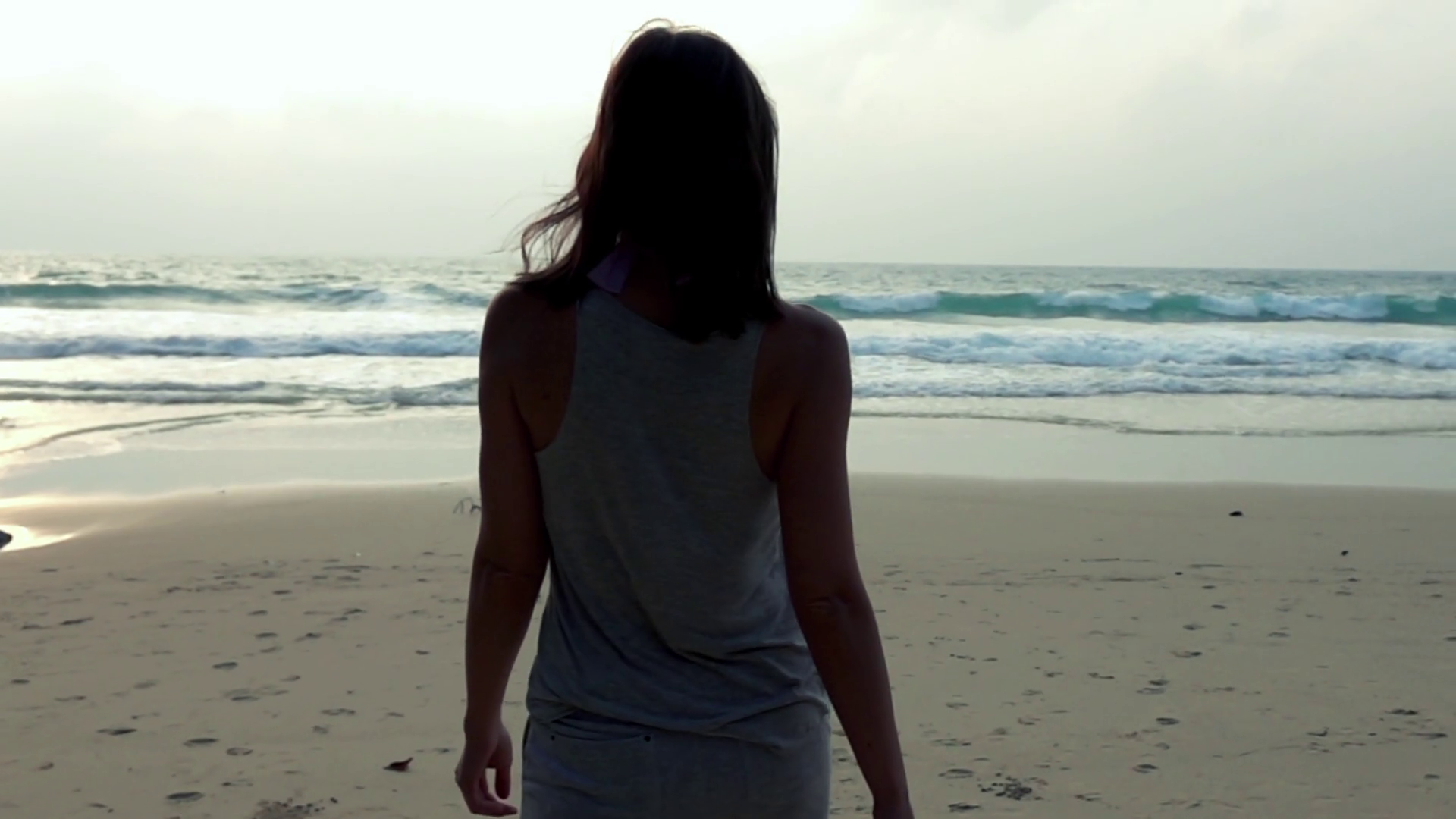 Beautiful woman walking along beach, super slow motion Stock Video ...