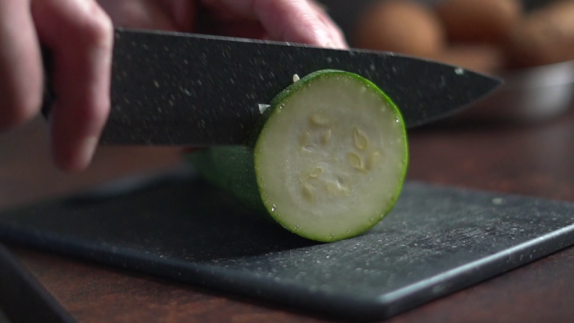 Closeup Of Male Hands Cutting Courgette On Stock Footage SBV-337566581 ...