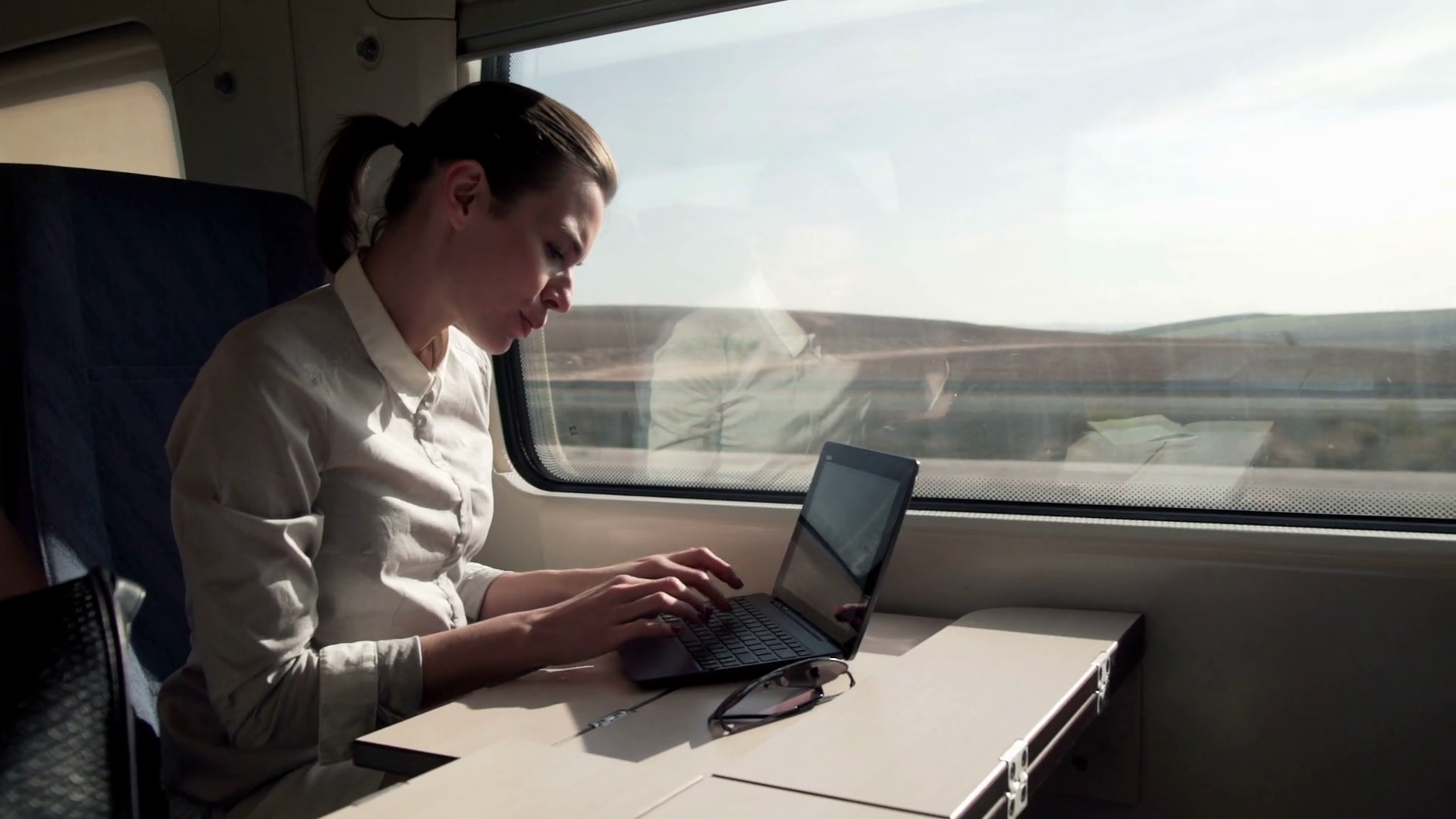 Professional Woman Working On Laptop In Train Stock Footage SBV ...