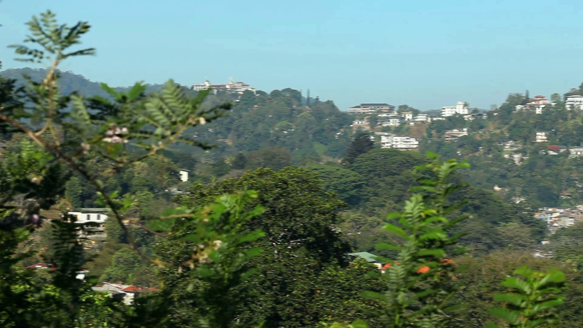 KANDY, SRI LANKA - FEBRUARY 2014: Pan shot of Kandy landscape. Kandy is ...