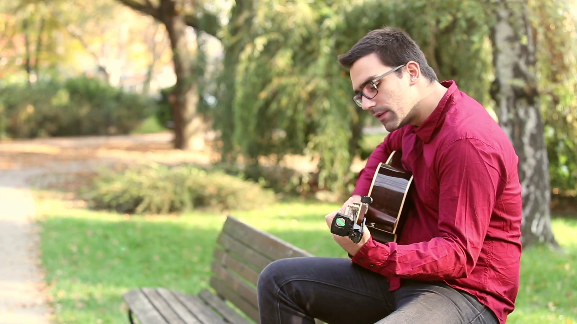 Young Man Playing The Guitar And Singing In The Park Graded Stock Video Footage 0008 Sbv