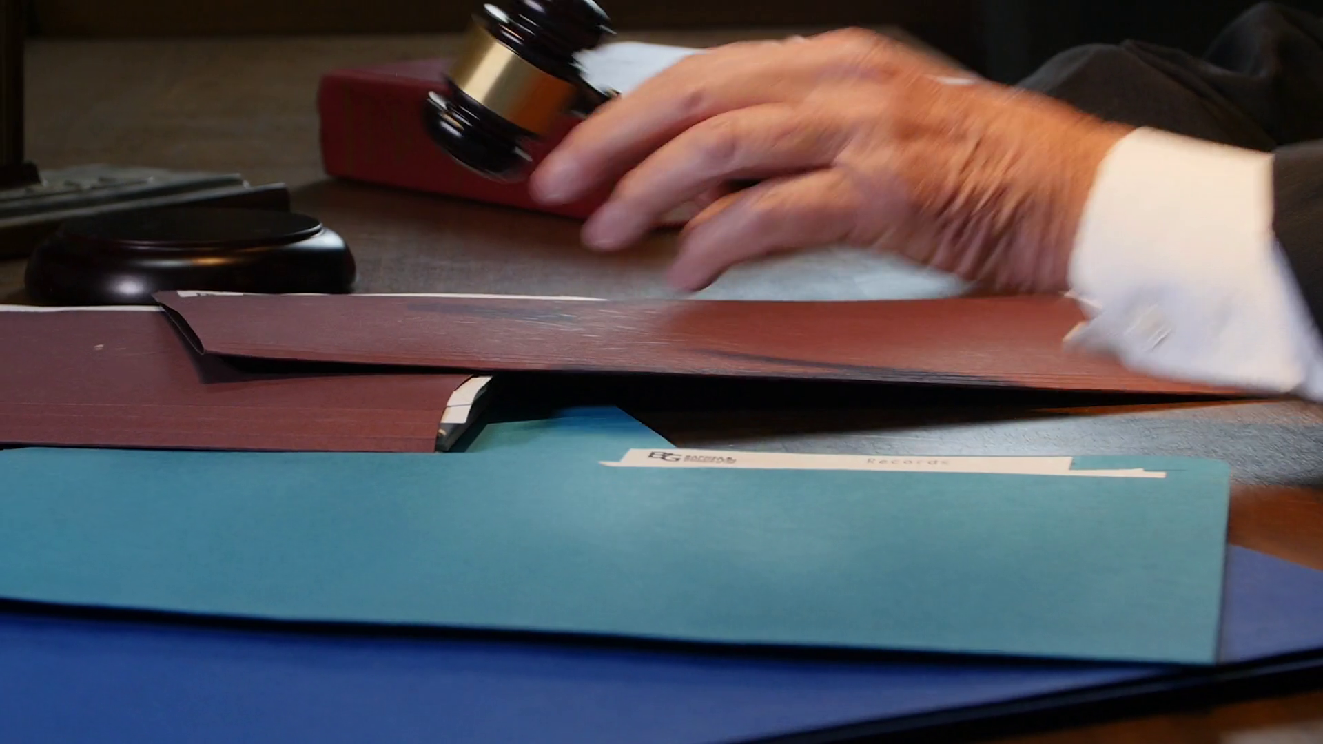 Judge Hand Close Up Opening Folder In Court Stock Footage SBV-352201515 ...