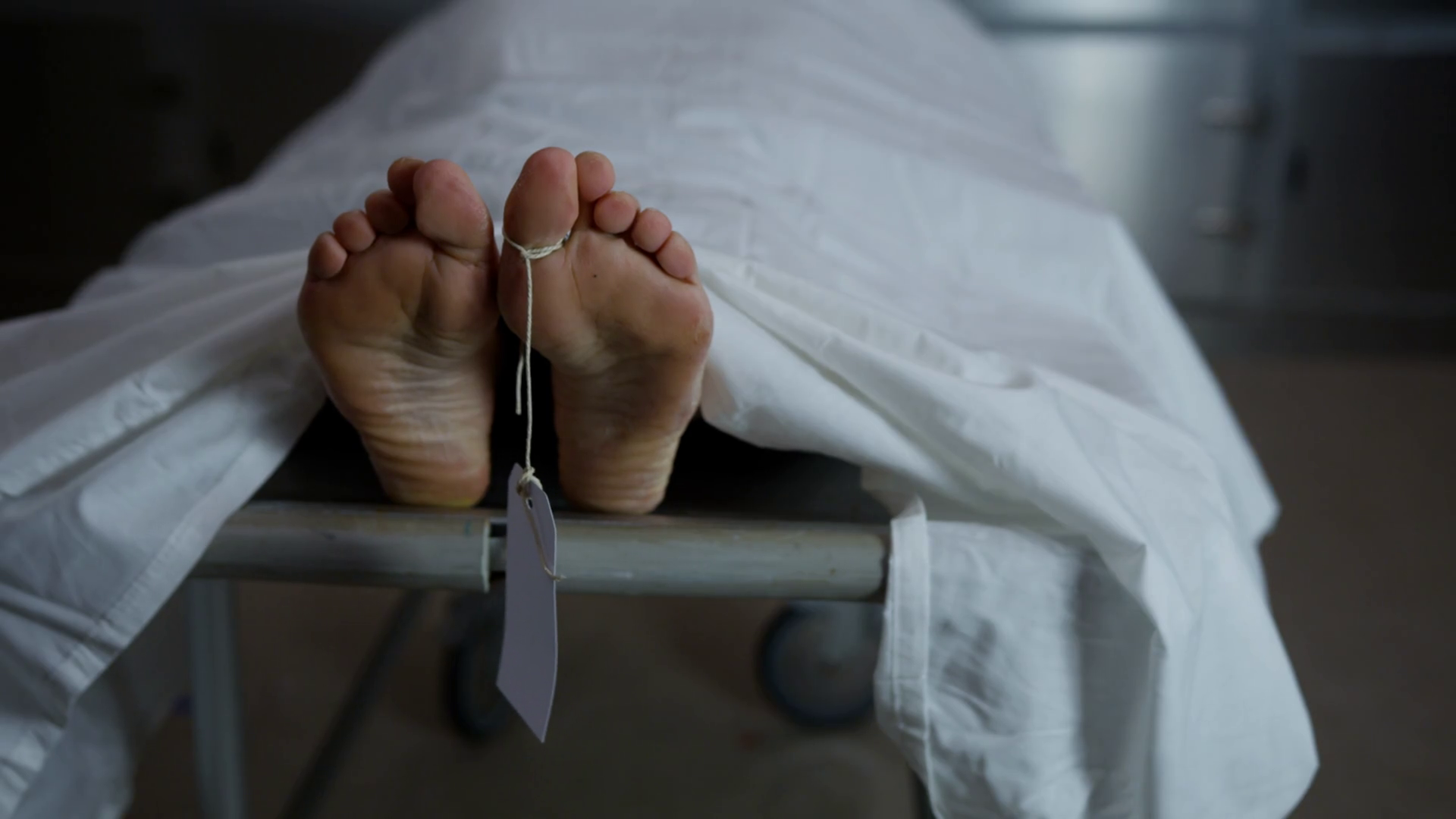 Morgue Female Feet On Gurney With Toe Tag Stock Footage SBV-352201629 ...