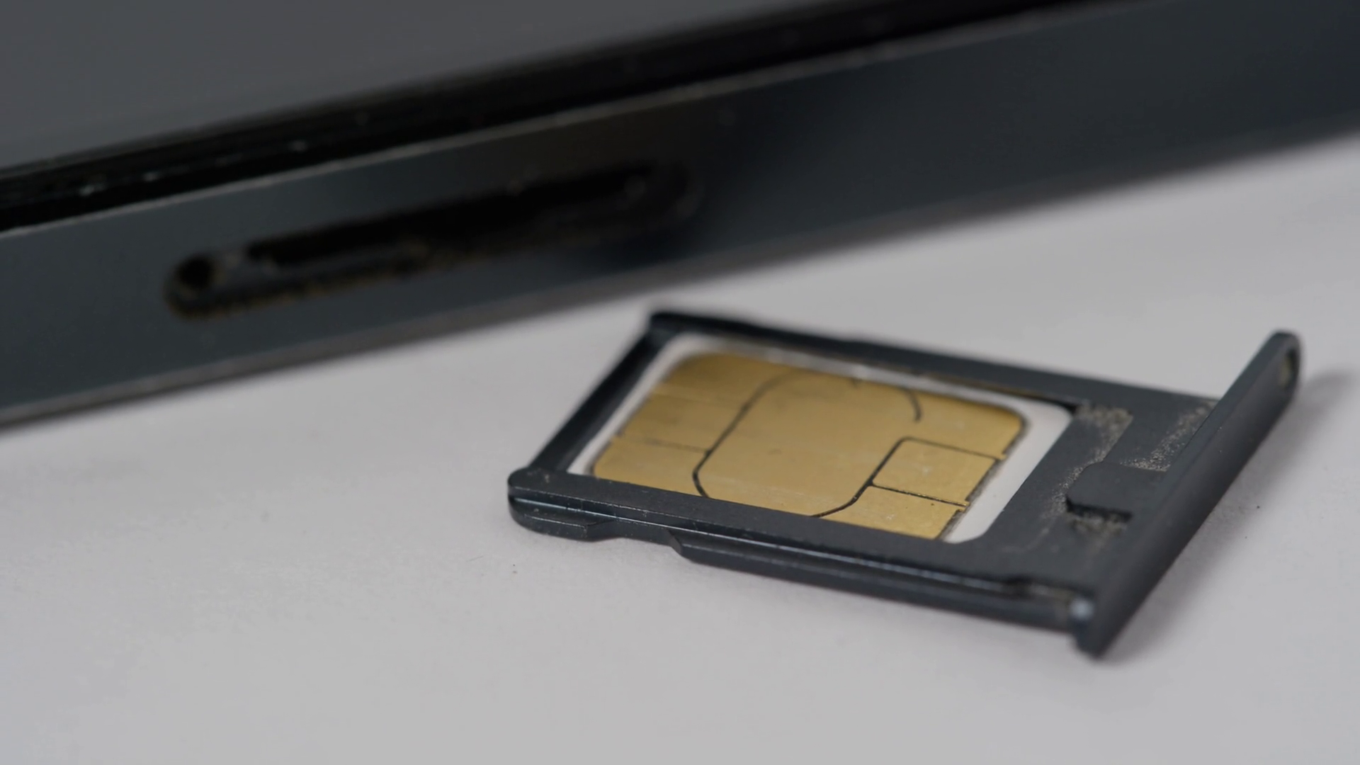 Tilt Up To Sim Card Smart Phone On White Stock Footage SBV-352199849 ...