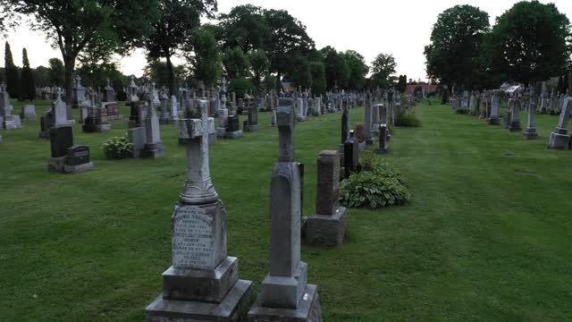 Family Walking In The Cementery Stock Footage: Royalty-Free Video Clips ...