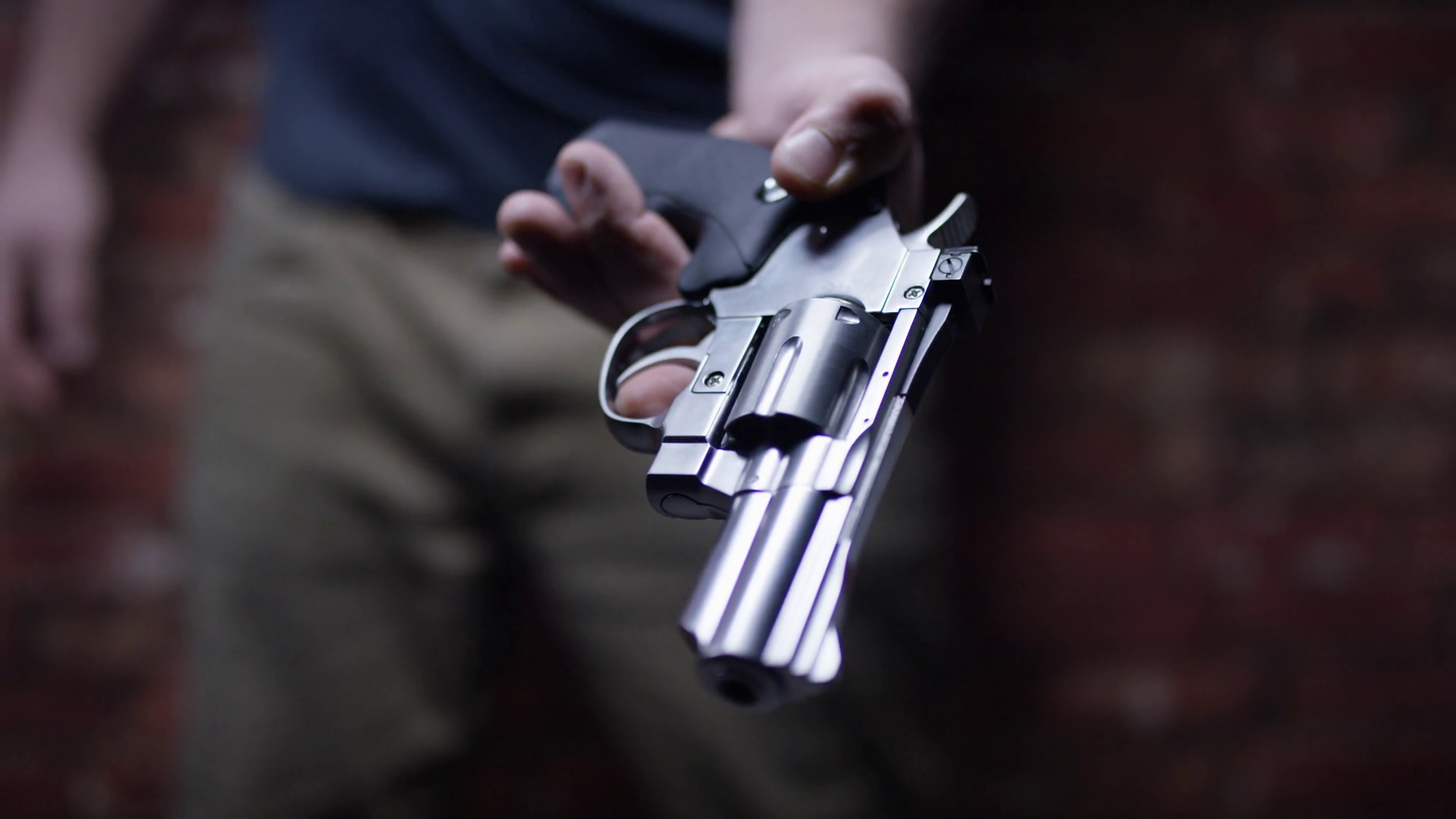Man Hands Over Firearm Weapon Revolver Stock Footage SBV-347543456 ...