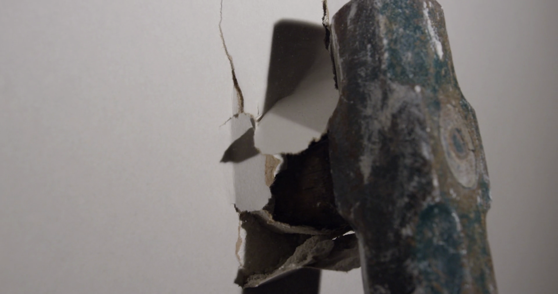 Man Punching Through Drywall In Slow Motion Stock Footage SBV-347710820 ...