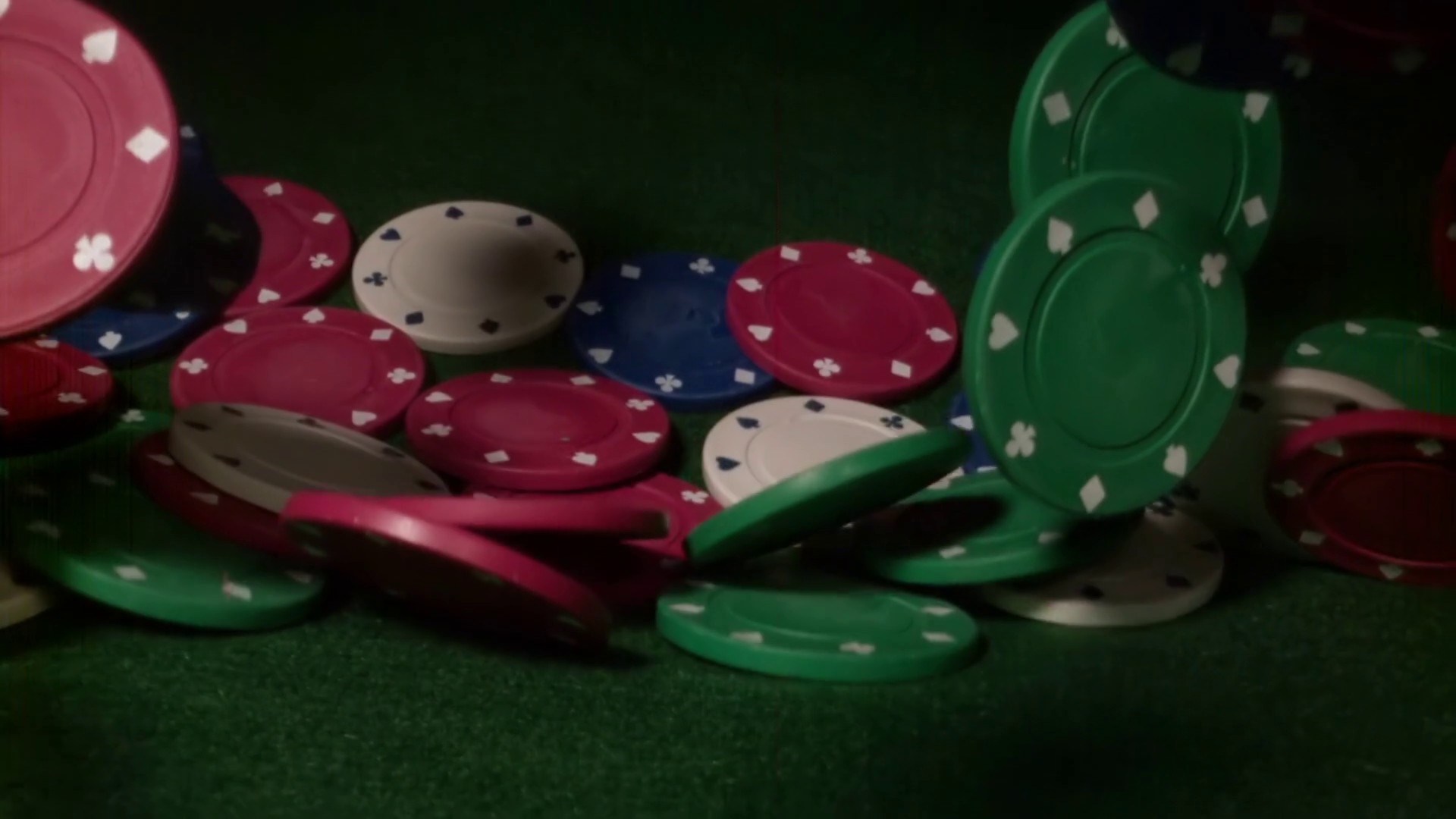 Poker Chips Slow Motion falling on a card table Stock Video Footage 00: ...