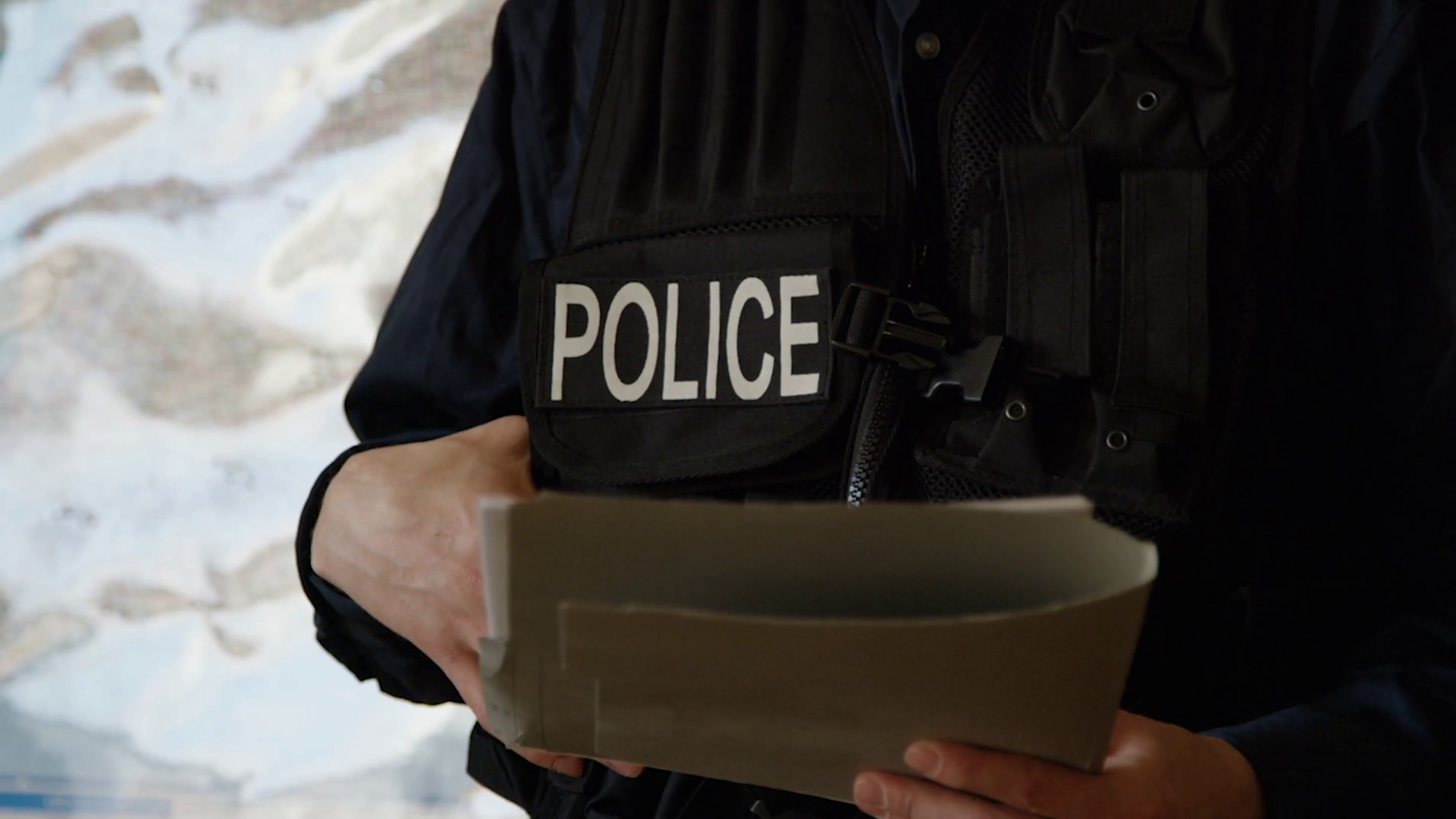 Police Officer Studying File In Front Of Map Stock Footage SBV ...