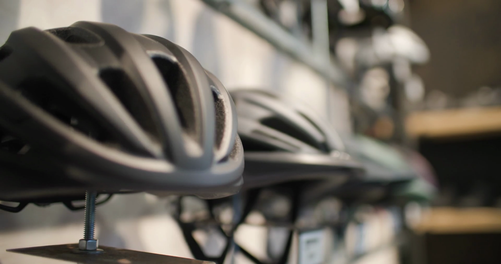 Rack Focus Along Helmets In Bike Shop Stock Footage SBV-351950187 ...