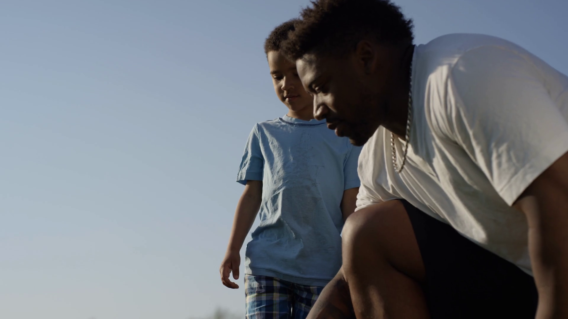 Sports Family Tilt Down To Kid Kicking Ball Stock Footage SBV-347719290 ...