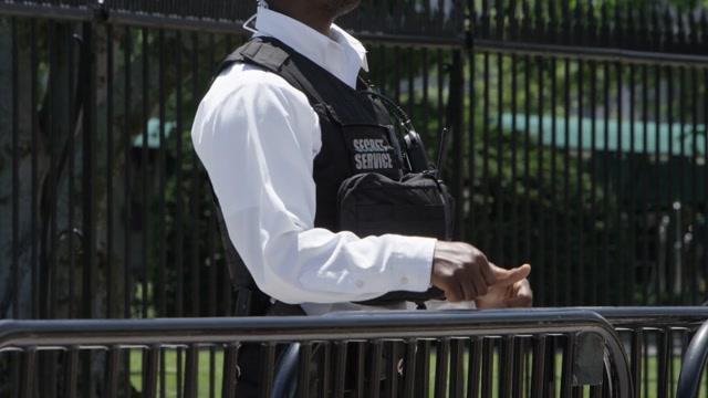 African American Woman Officer On A Stake Out Stock Footage: Royalty ...