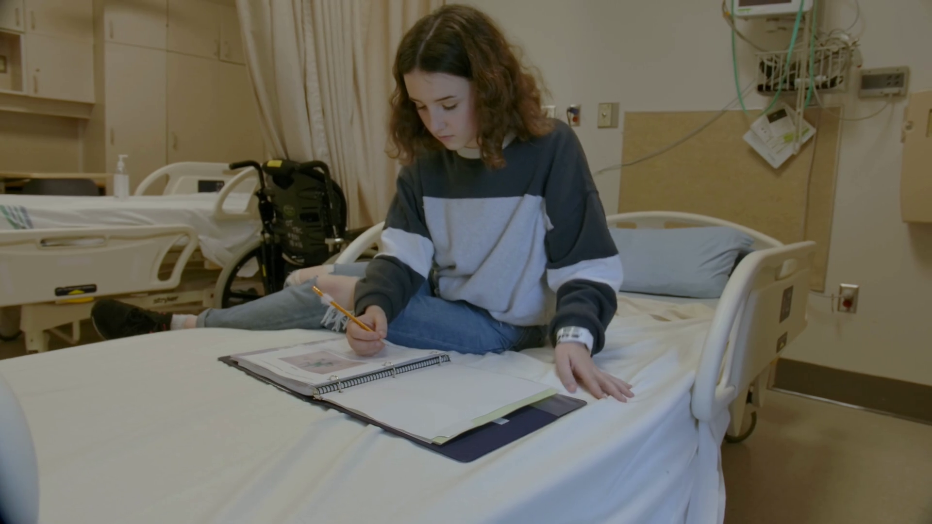 Young Girl Doing Homework In Hospital Bed Stock Footage SBV-348498624 ...