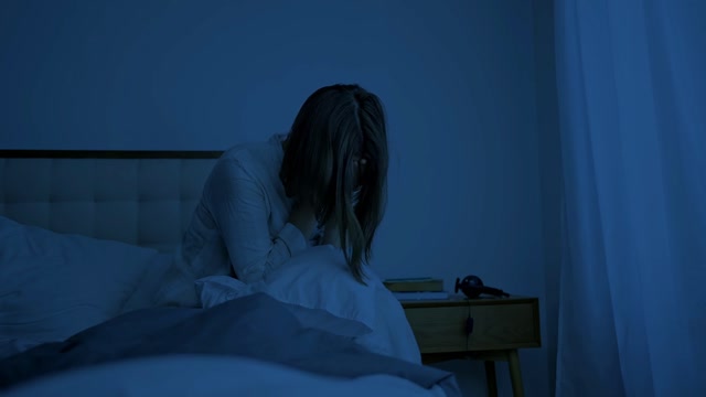 Woman Waking Up Scared Stock Footage: Royalty-Free Video Clips ...