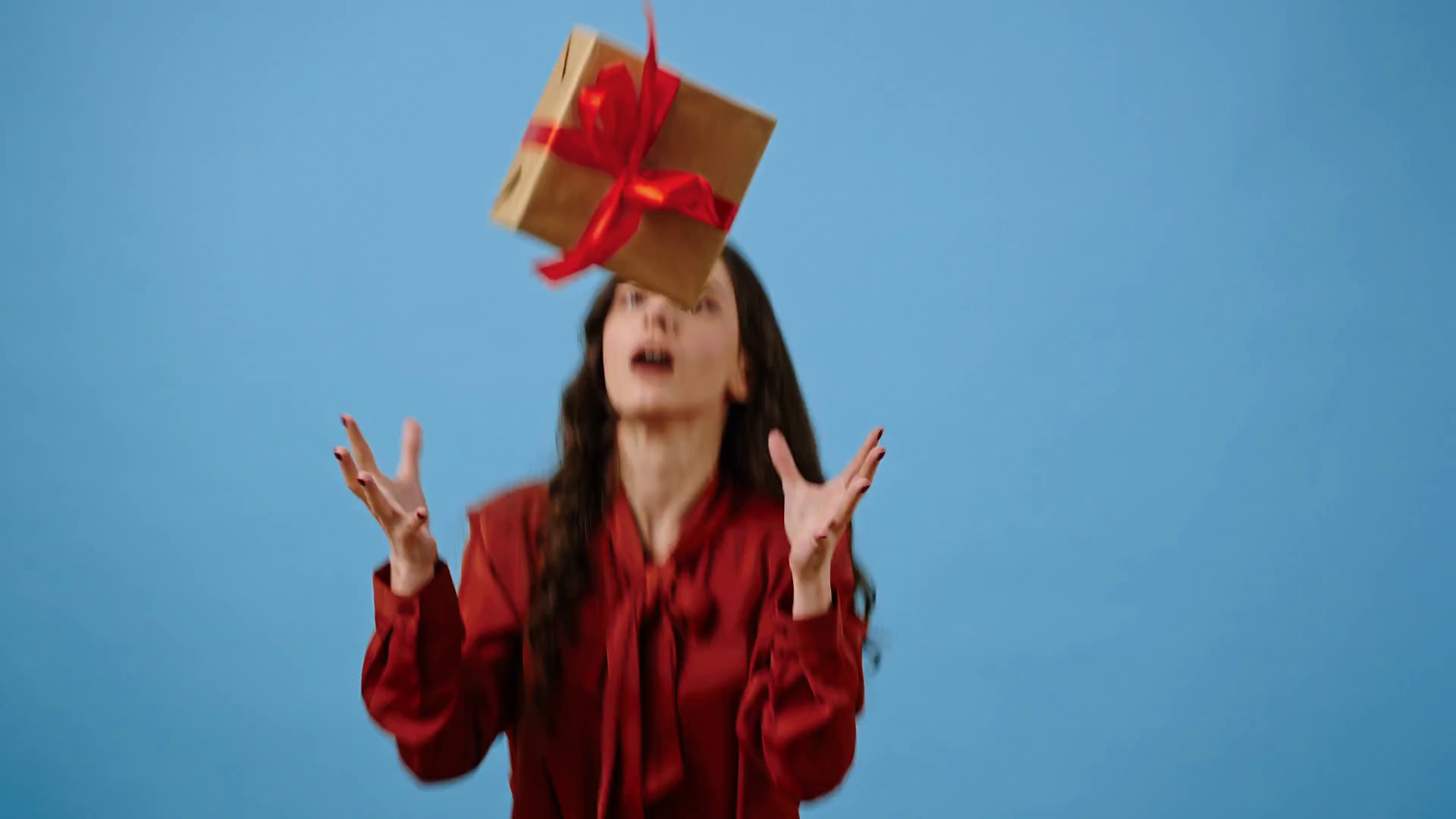 Woman Catches Gift Box With Red Ribbon Stock Footage SBV-347567613 ...