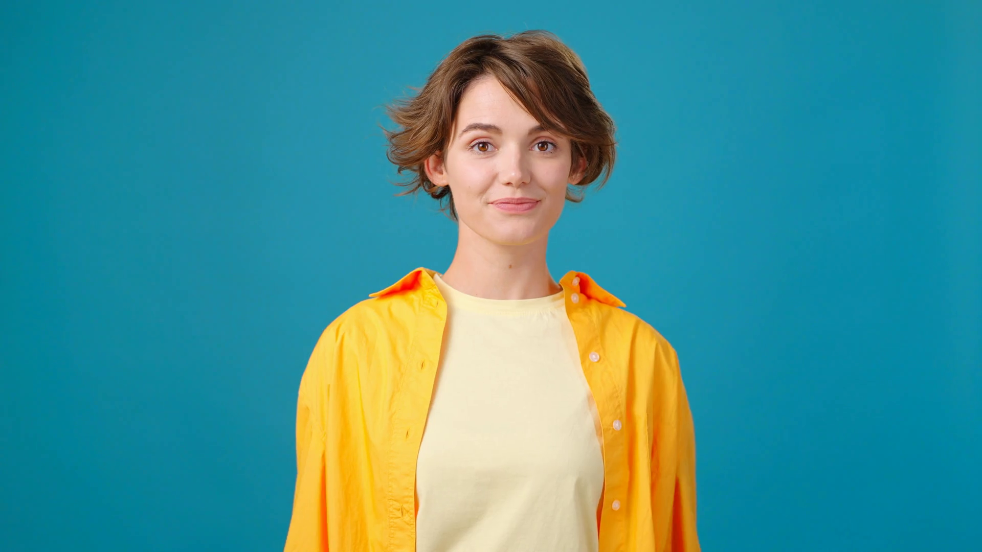 Young Woman Smiles Cutely Showing Sign With Stock Footage SBV-347796065 ...