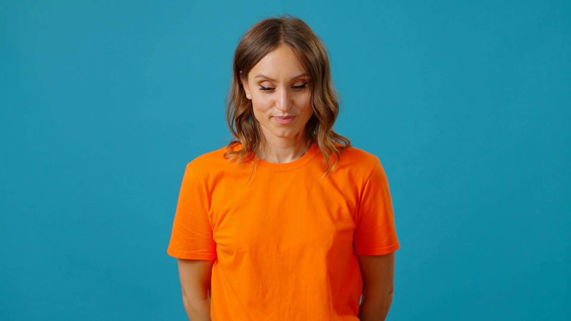 Generous Young Woman Smiles Cutely Gives Stock Footage SBV-348378734 ...