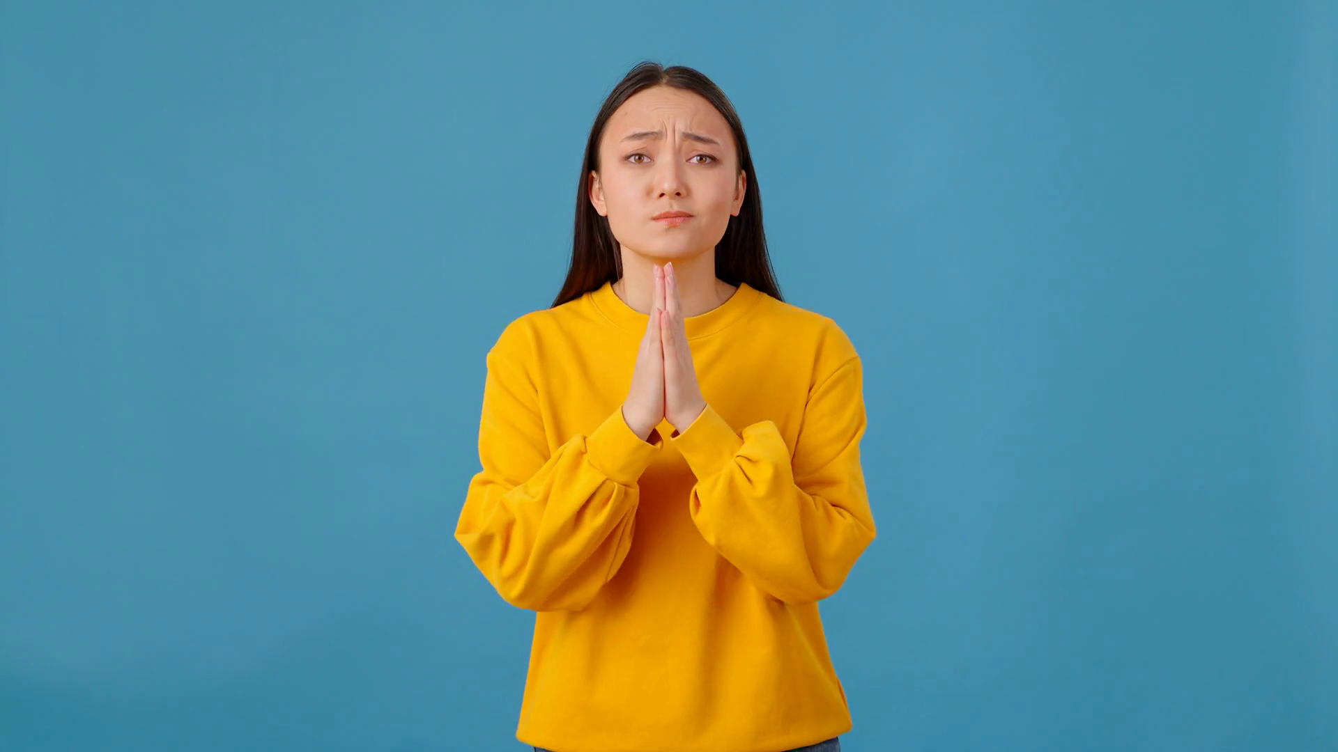 Young Female Praying Saying Please Over Blue Stock Footage SBV ...
