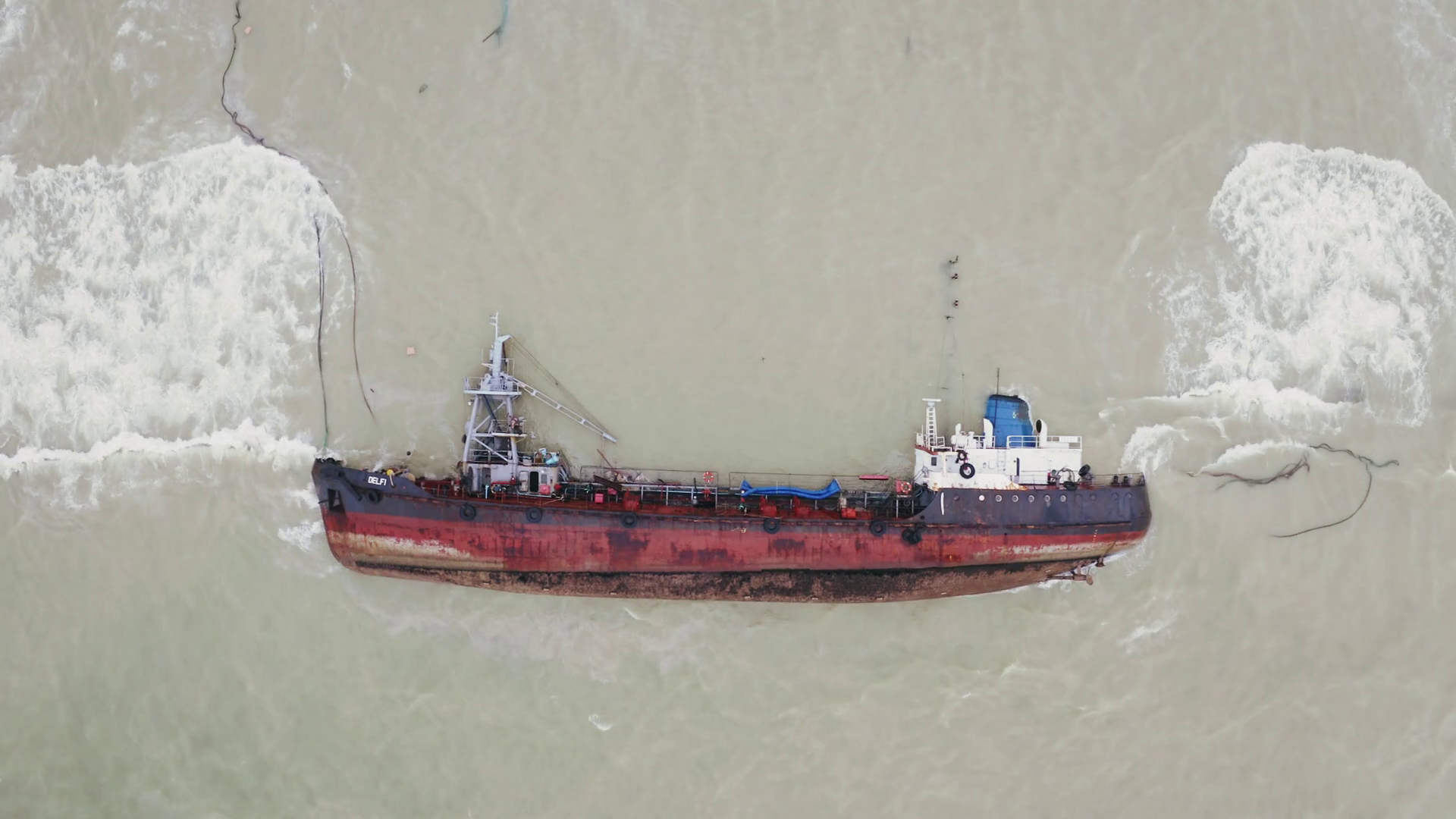 Aerial top down view of sunken cargo ship tanker wrecked on Black Sea ...