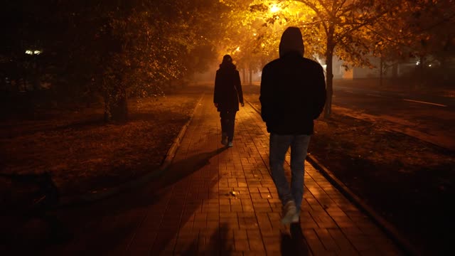 Man Stalking Stock Footage: Royalty-Free Video Clips - Storyblocks