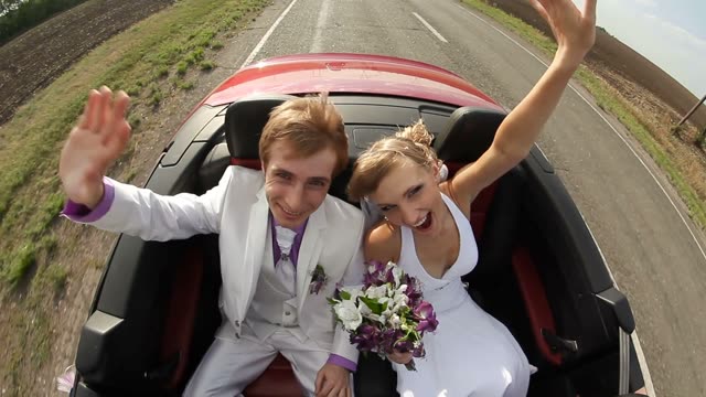 Couple Driving | Holidays and Celebrations stock footage - Storyblocks