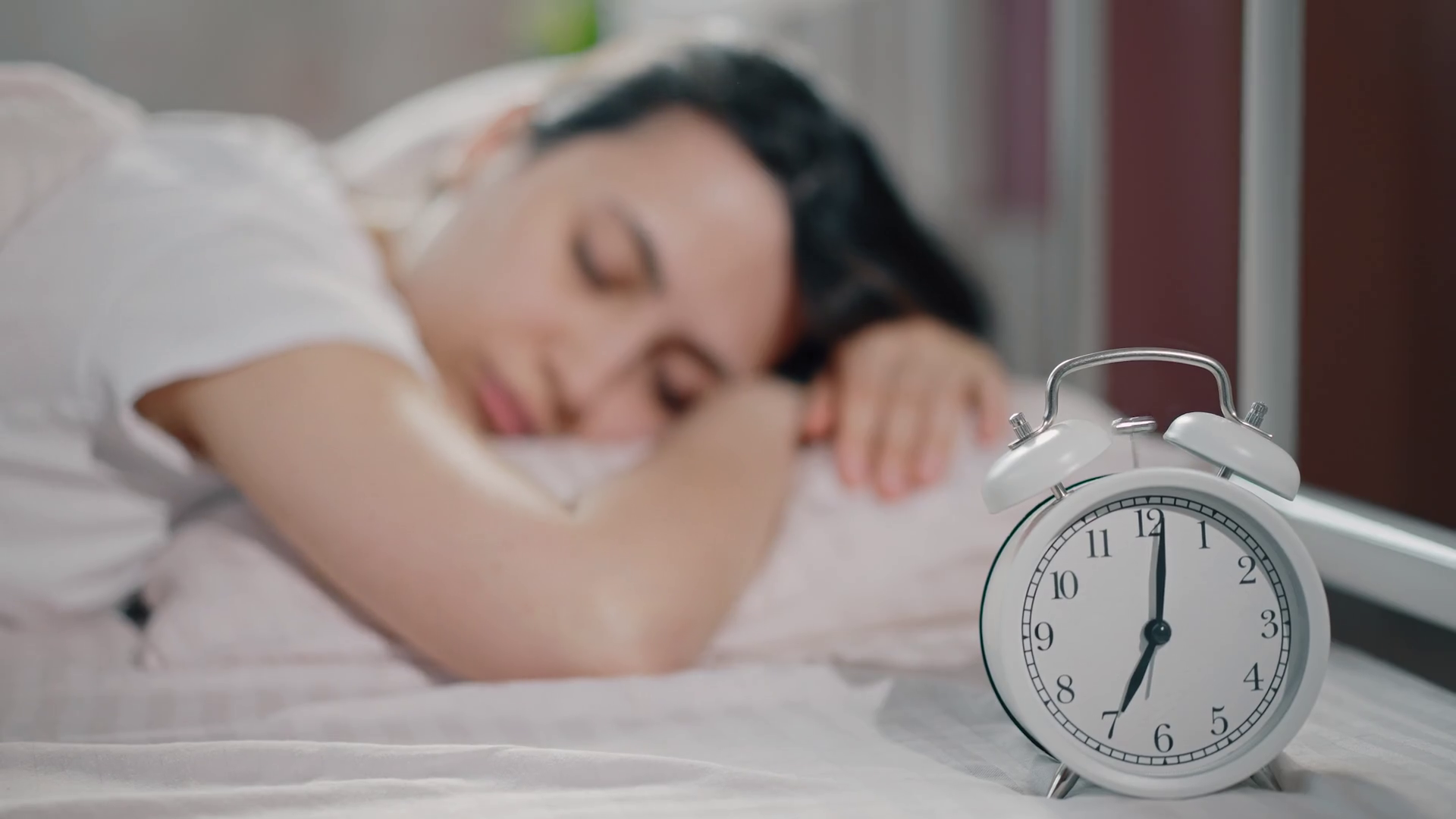 Woman Wakes Up From Alarm Clock Stock Footage SBV-346853390 - Storyblocks
