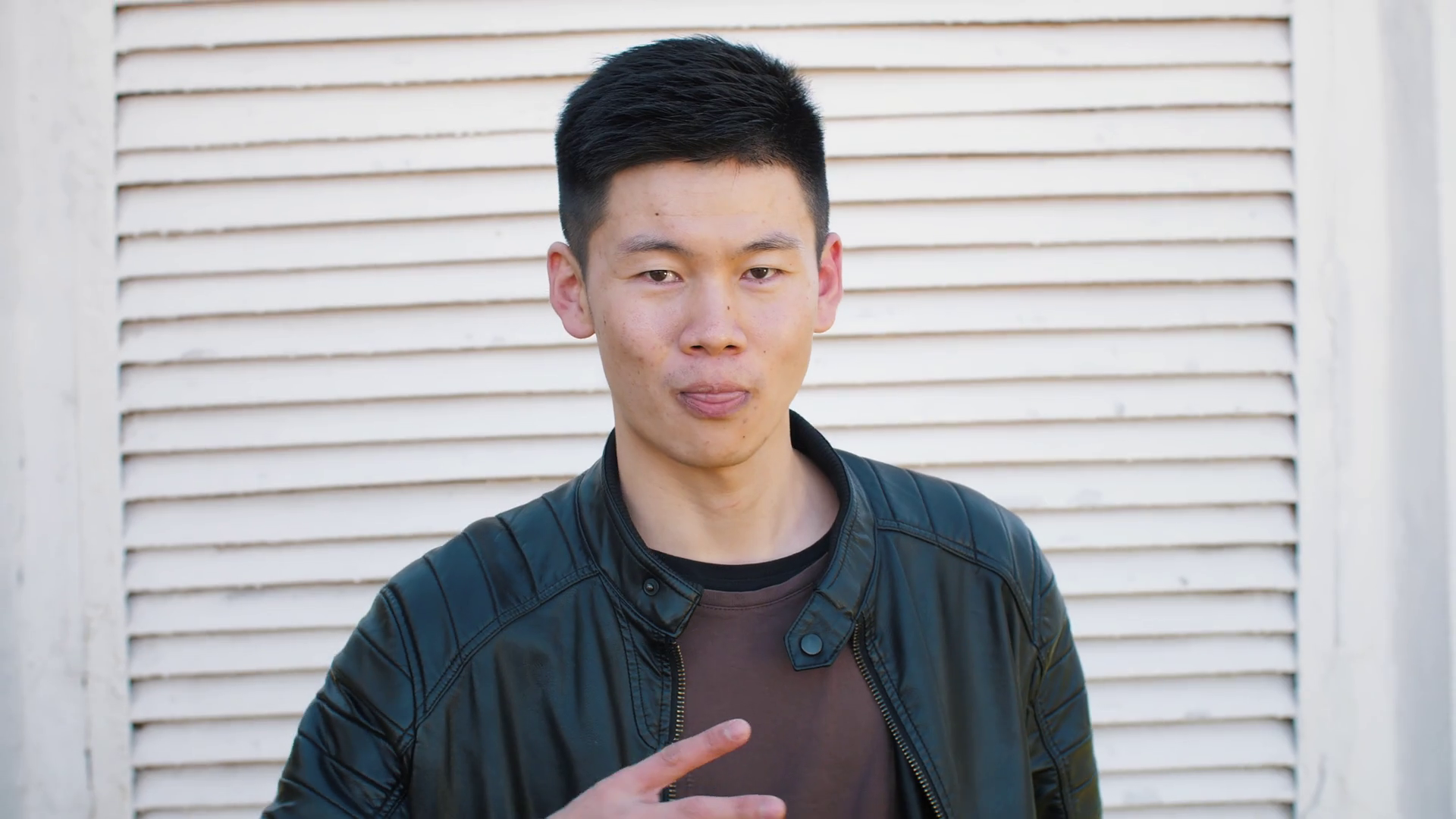 Chinese Man Showing Peace Sign Stock Footage SBV-323400480 - Storyblocks