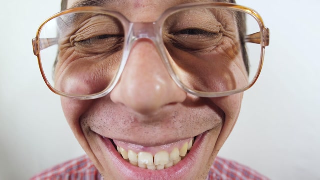 Laughing Shortsighted Eyes Stock Footage: Royalty-Free Video Clips ...