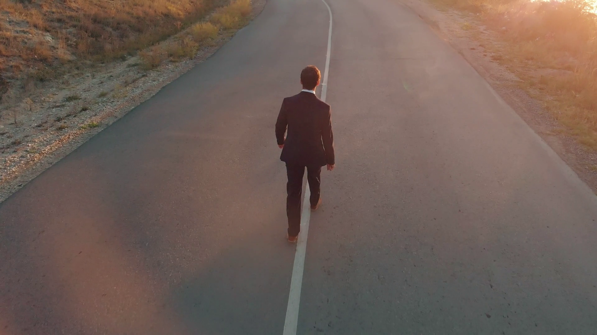 Man In Suit Walking Straight Road Stock Footage SBV-328836380 - Storyblocks
