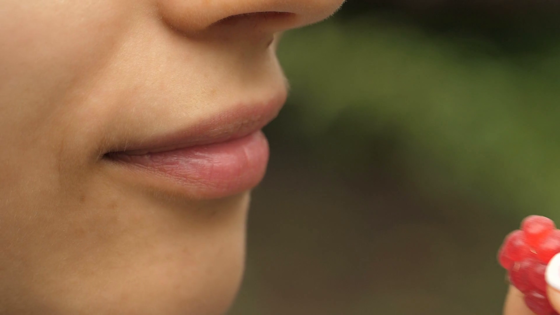Woman Eating Raspberry Stock Footage SBV-315790767 - Storyblocks