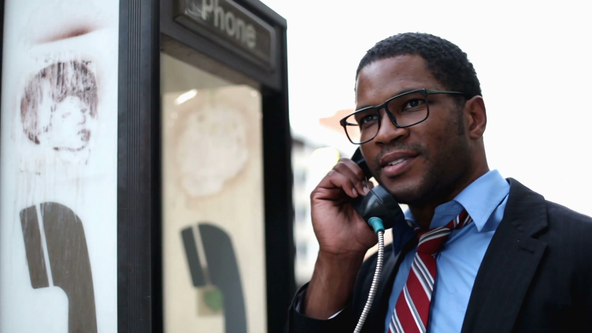 African American Man Talking On Payphone Stock Footage SBV-301092305 ...
