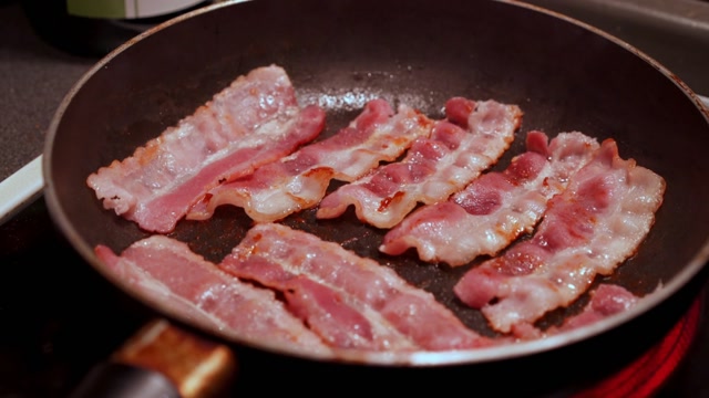 Eating Bacon Stock Footage: Royalty-Free Video Clips - Storyblocks