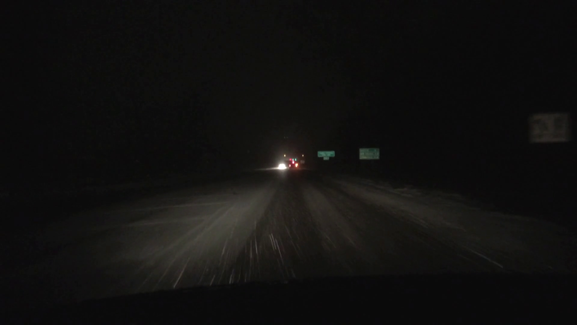 Driving Down Snow Covered Street At Night Stock Footage SBV-301142441 ...