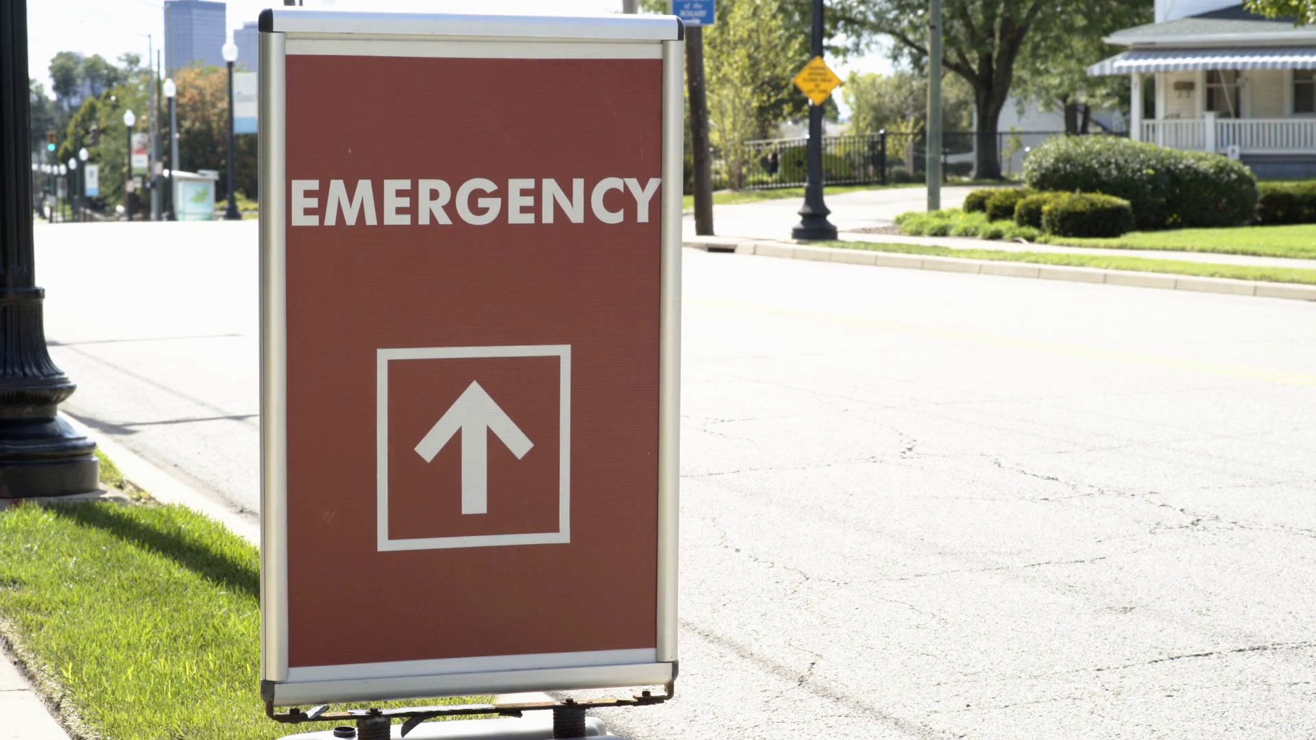 Emergency street sign pointing down the street 4k Stock Video Footage ...