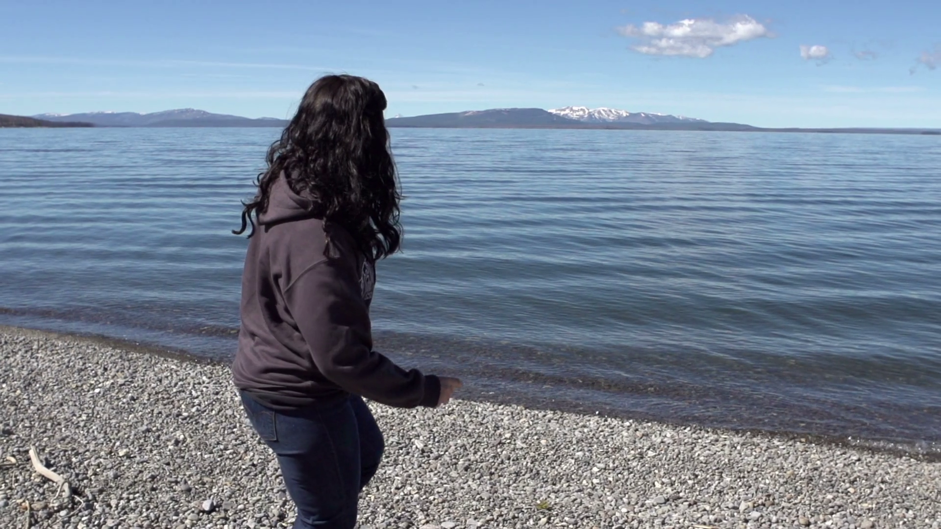 Female Skipping Rocks In Lake Stock Footage SBV-301337888 - Storyblocks
