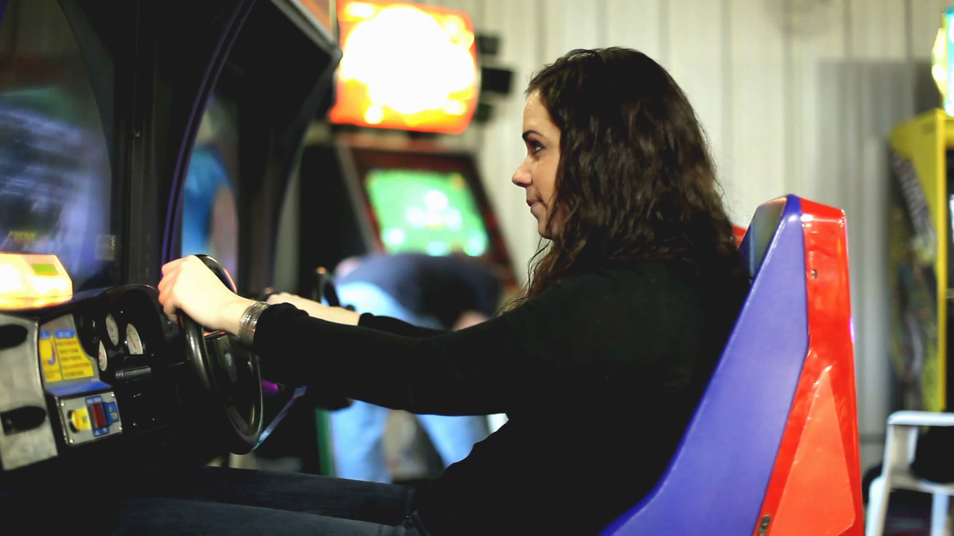 Girl Playing Racing Arcade Game Stock Video Footage 00:09 SBV-301058732 ...