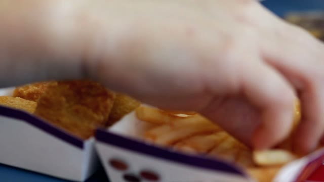 Kid Eating Meat Stock Footage: Royalty-Free Video Clips - Storyblocks