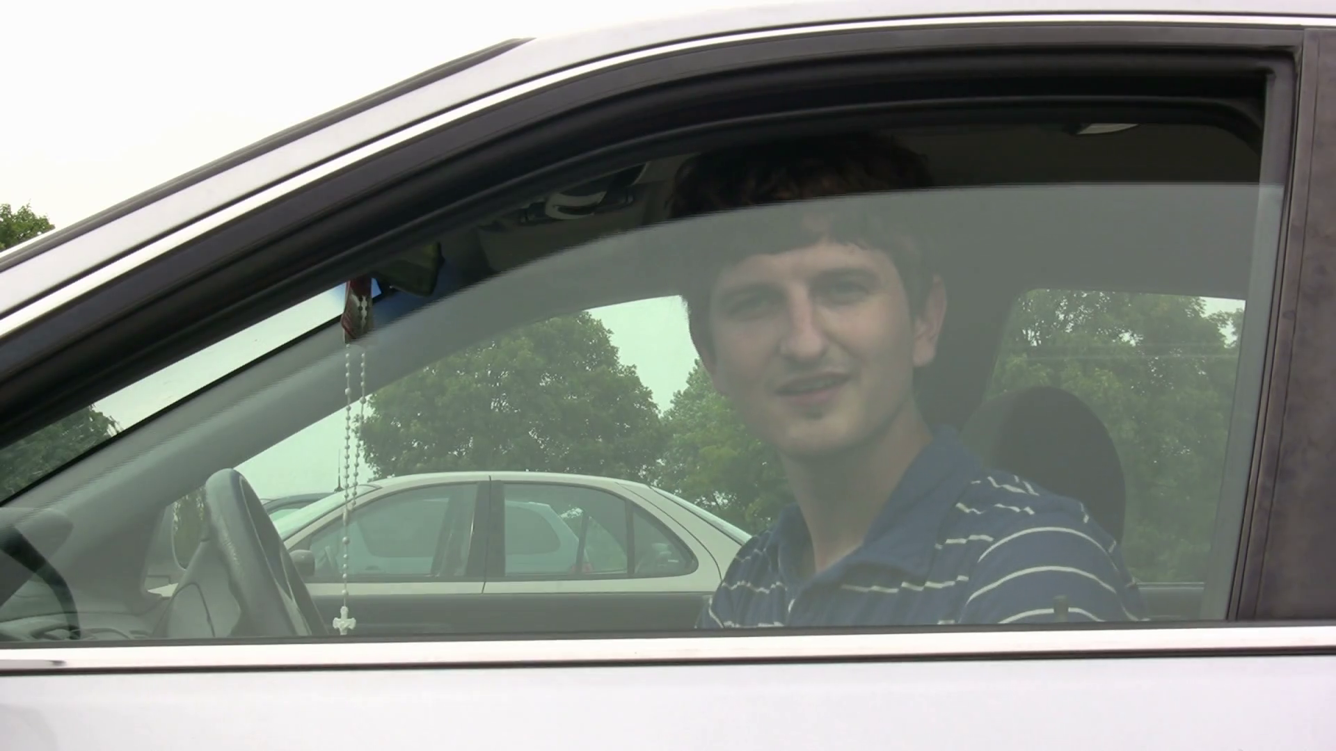 Man Rolls Down Car Window Waves Stock Footage SBV-301058641 - Storyblocks