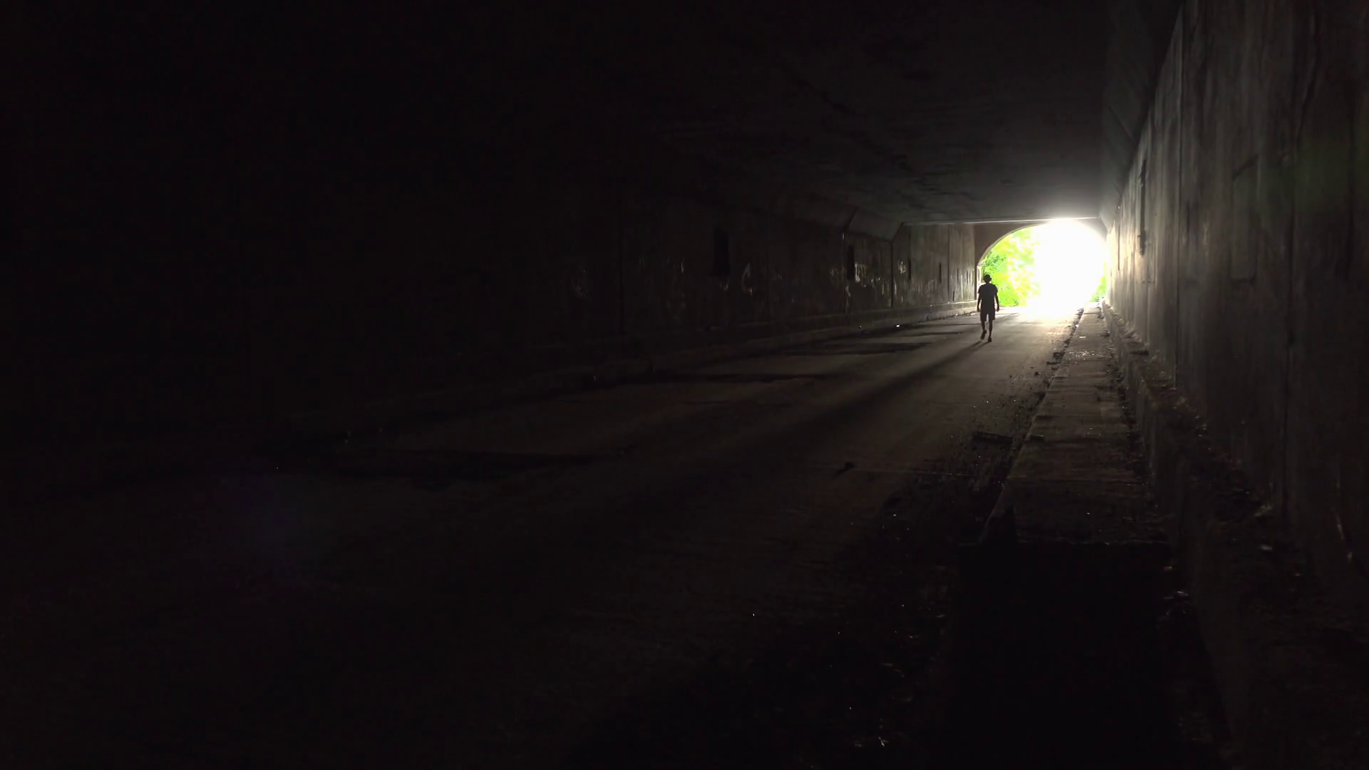 Strange Man Walking Down Dark Tunnel Stock Footage SBV-311467865 ...