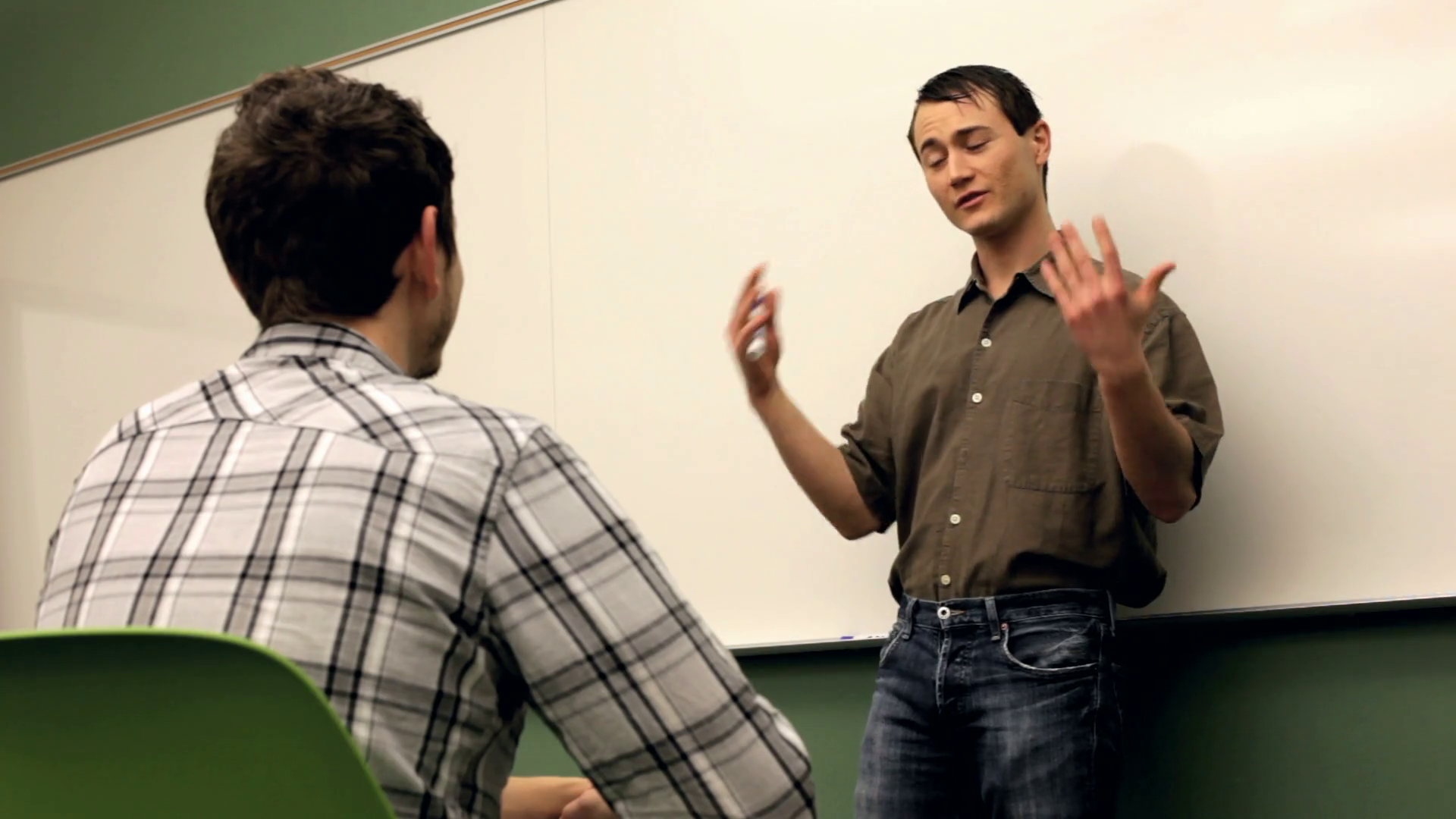 Teacher Talking To Student In Classroom Stock Footage SBV-301101089 ...